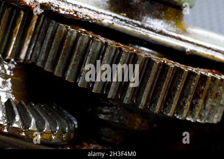 Worn grease can be seen inside the cog wheels unit. This is a partial ...