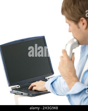 Portrait of man using electric razor Stock Photo - Alamy