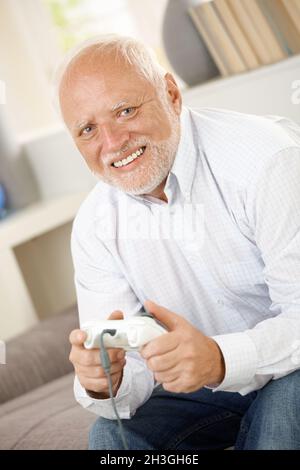 Portrait of elderly people playing computer game Stock Photo - Alamy