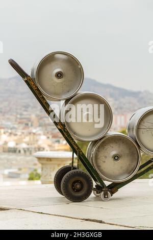 Vertical shot of beer cans stacked on a metal wheelbarrow Stock Photo ...