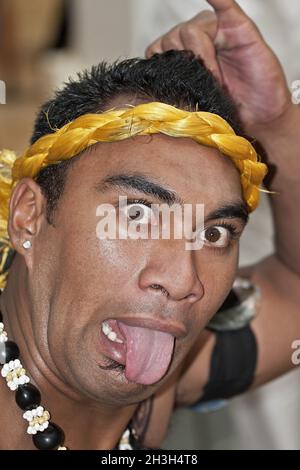 MAORI WITH TONGUE OUT with traditional facial tattoo (moko) and ...