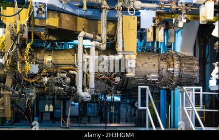 A Pratt & Whitney F135 engine hangs in Arnold Engineering Development ...