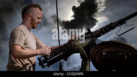 American soldier firing the turret machine gun on a Sherman Tank Stock ...