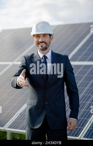 Business client at solar station happy and ready to handshake Stock ...
