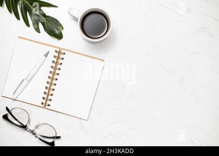 Opened notebook and coffee cup on wooden background, top view Stock ...