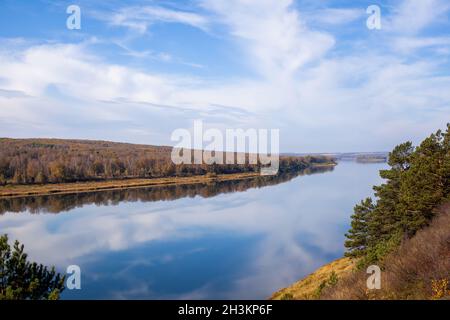 Beautiful, wide river autumn among the woods Stock Photo - Alamy