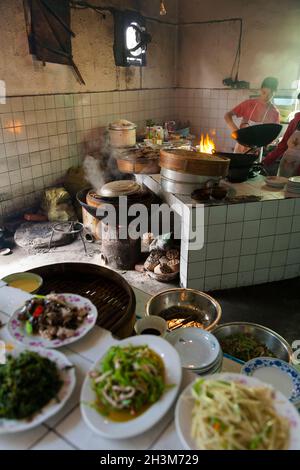 Busy hot messy untidy local & cheap kitchen serving delicious genuine ...