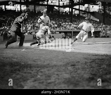 Stanley Harris, Washington is out trying to steal home as James Sewell ...