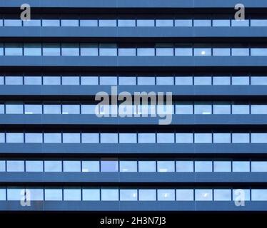Long rows of windows of an office building from the 1960s Stock Photo ...