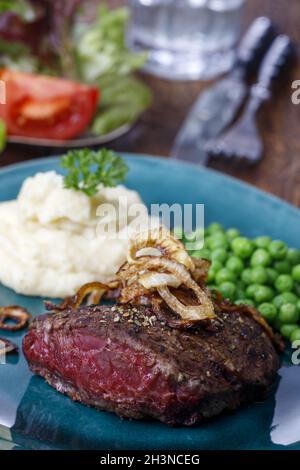 Grilled Steak with Salad and Mashed Potatoes Stock Photo - Alamy