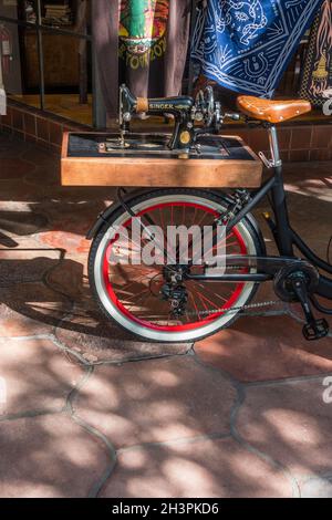 A sewing machine mounted on a bicycle Stock Photo - Alamy