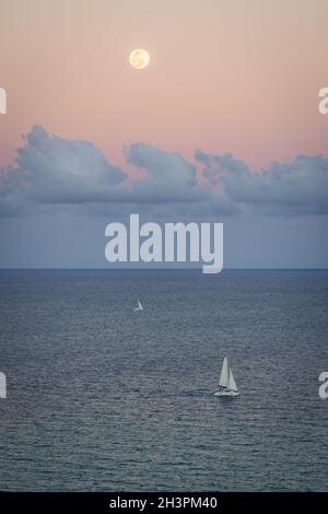 A beautiful setting moon over the Atlantic Ocean. Florida, USA Stock ...