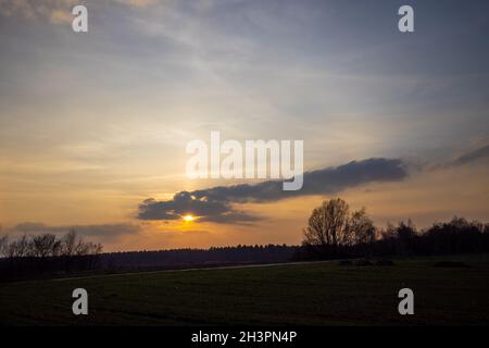 Dramatic colorful cloudy sky with picturesque clouds lit by sunset ...