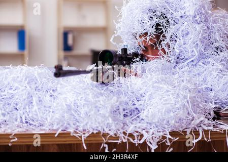 Young businessman employee and a lot of cut papers in the office Stock ...