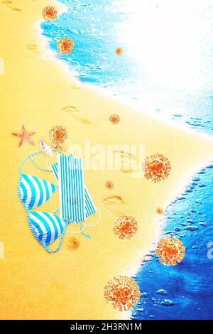 Striped bikini and corona virus mask on vacation Stock Photo - Alamy