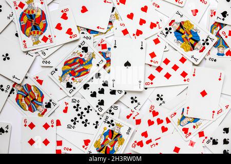 Classic playing card game laid out on a table. White background Stock ...