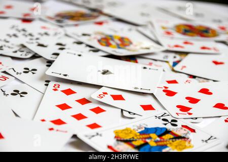 Classic playing card game laid out on a table Stock Photo - Alamy