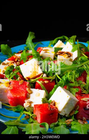 Watermelon Rocket Feta Salad with cheese Stock Photo - Alamy