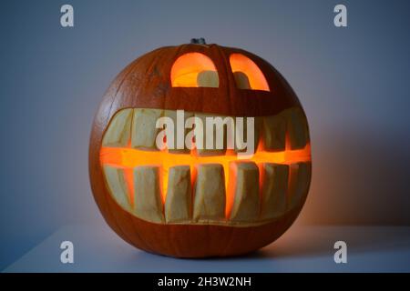 Spooky pumpkin lit from within, Jack O' Lantern with a toothy grin ...