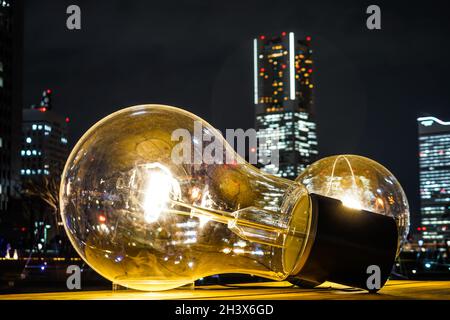 Huge light bulbs and Landmark Tower Stock Photo - Alamy