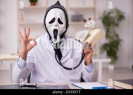 Devil doctor working at the hospital Stock Photo - Alamy