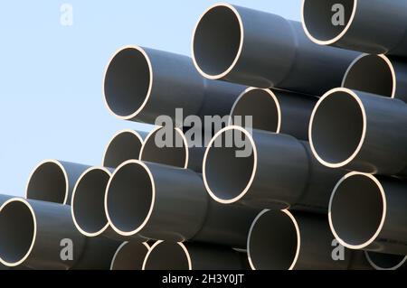 A stack of PVC conduit Stock Photo - Alamy