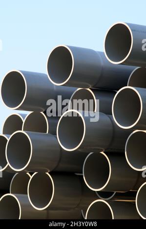 A stack of PVC conduit Stock Photo - Alamy