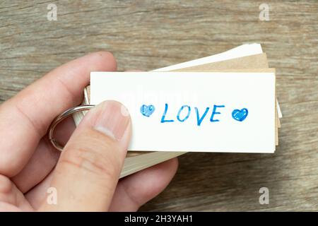 Flash card with handwriting word love on wood background Stock Photo ...