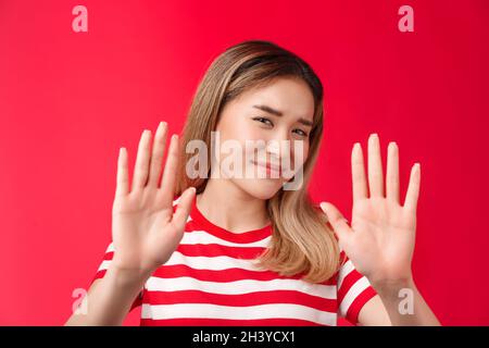 No thanks I pass. Reluctant lazy cute asian modern girl show hands ...