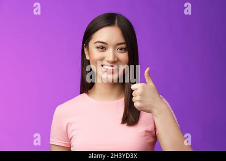 Friendly good-looking supportive asian female friend encourage you keep ...