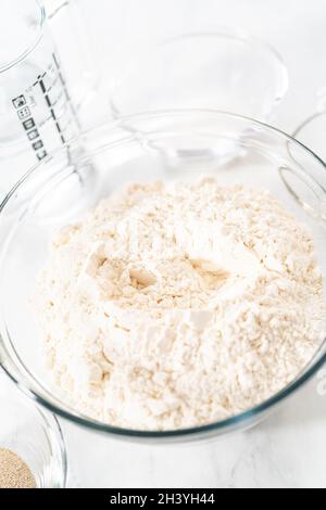 Measured ingredients in glass bowls to prepare mermaid cakesicles Stock ...