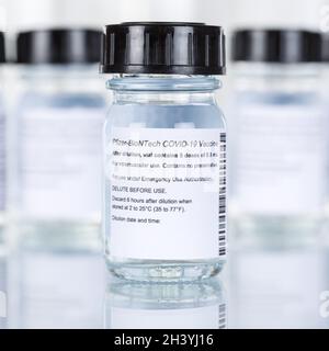 Vaccine for COVID-19 and Pfizer logo, in Prague, Czech Republic, April ...