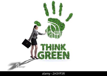 Think green ecological concept with the businesswoman Stock Photo - Alamy