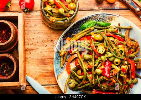 Spicy vegetable appetizer made from pepper, asparagus beans, tomato and ...