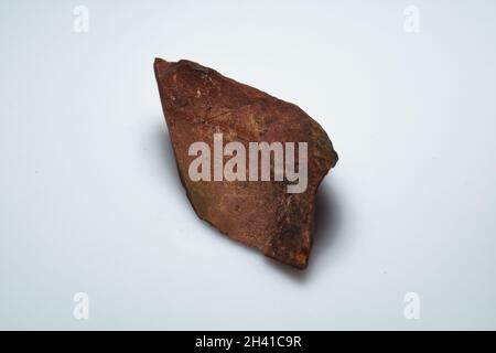 natural jasper mukaite ore on background Stock Photo - Alamy