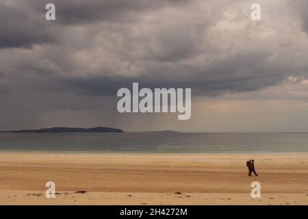 Looking out to sea at Polin Bay, Sutherland, Scotland, across the sand ...