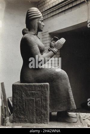A sculpture of Gula, Mesopotamian deity of healing: side view ...