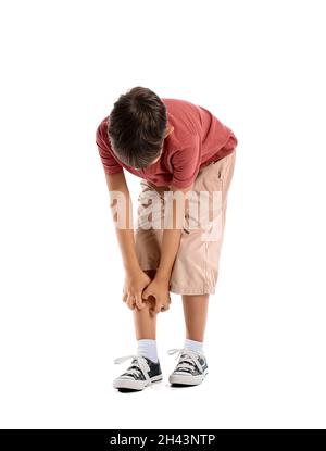 Little boy scratching himself on white background Stock Photo - Alamy
