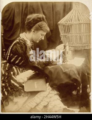 May Prinsep reading a letter, 1870 Stock Photo - Alamy