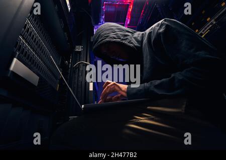 Cybercriminal attempting to hack computer network security system Stock ...