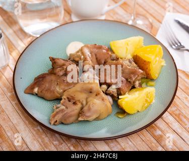 Just cooked pig's trotter on table Stock Photo - Alamy
