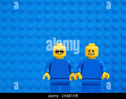 Two Lego minifigures - one scared and one happy. Lego minifigures are ...