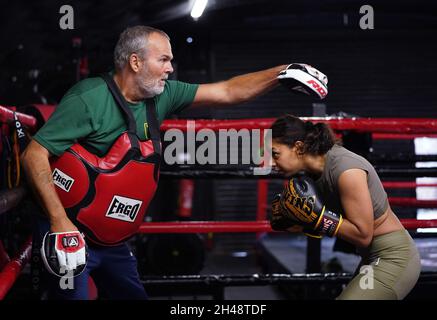 British professional boxer Ruqsana Begum with her coach Bill Judd ...