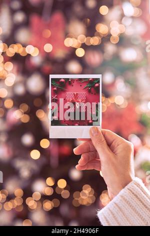 Christmas greeting card with xmas decor in fir tree shaped box on ...