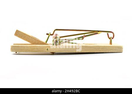 Macro photo of a spring loaded mousetrap, isolated on a white ...