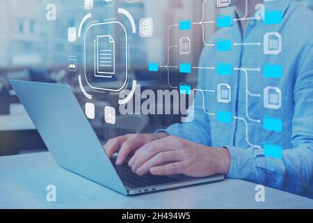 IT working on computer Business processes Document Management System ...