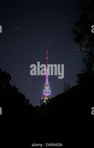 Colorful lights of the Telstra Tower in Canberra Nightscape Stock Photo ...