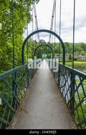Suspension bridge crossing the river Tummel and connecting Pitlochry ...
