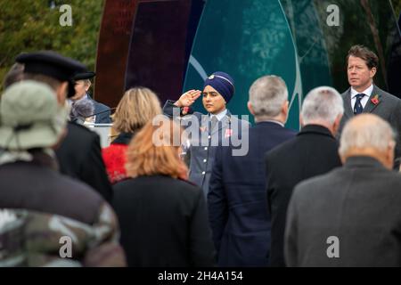 Sikh Chaplain Mandeep Kaur MBE (at podium), taking part in the opening ...
