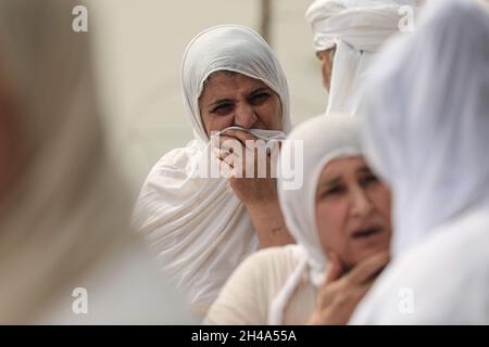 Baghdad, Iraq. 01st Nov, 2021. A Mandaean woman takes part in a baptism ...